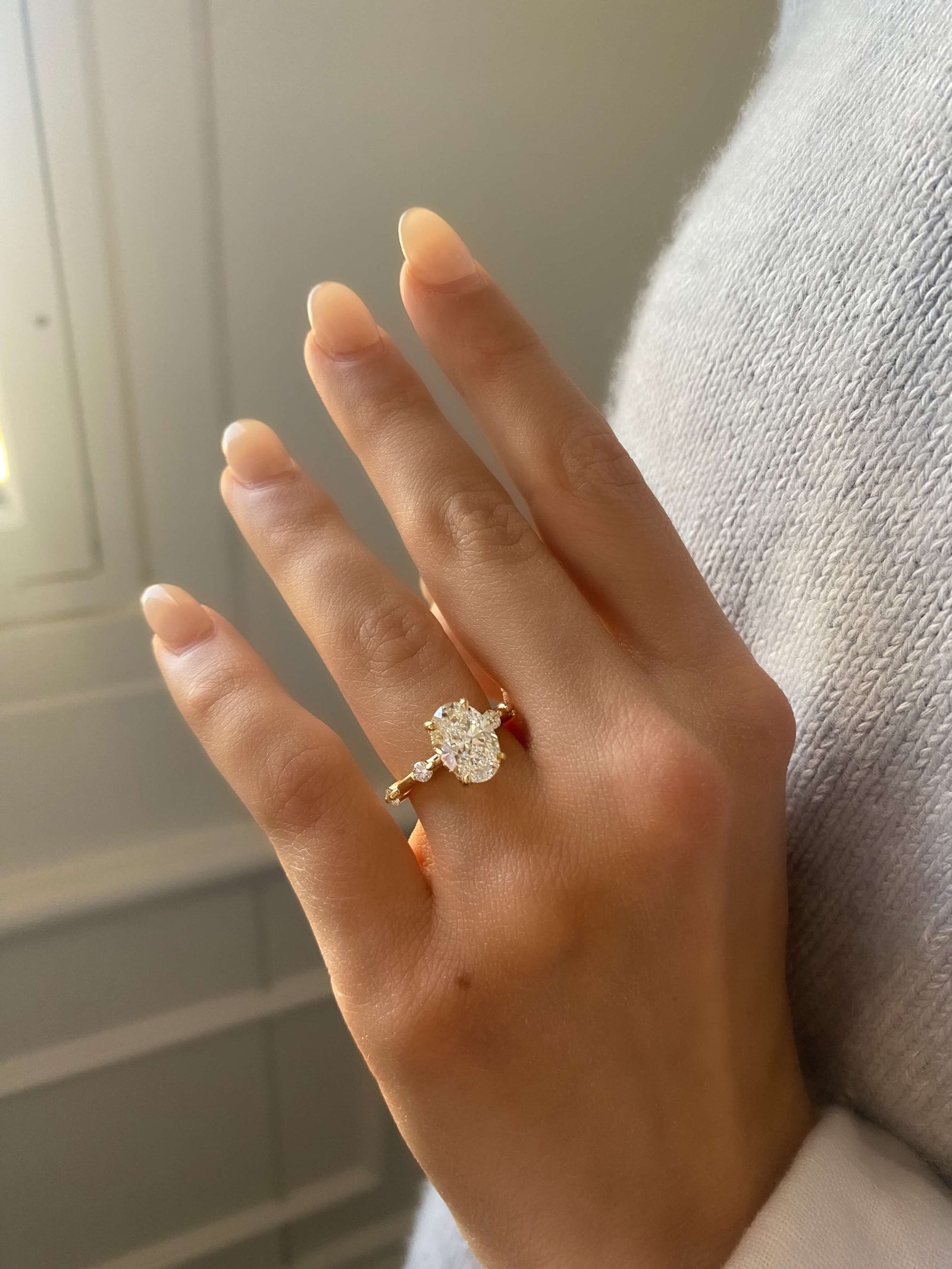 Oval Cut Solitaire Diamond Accent Classic Halo